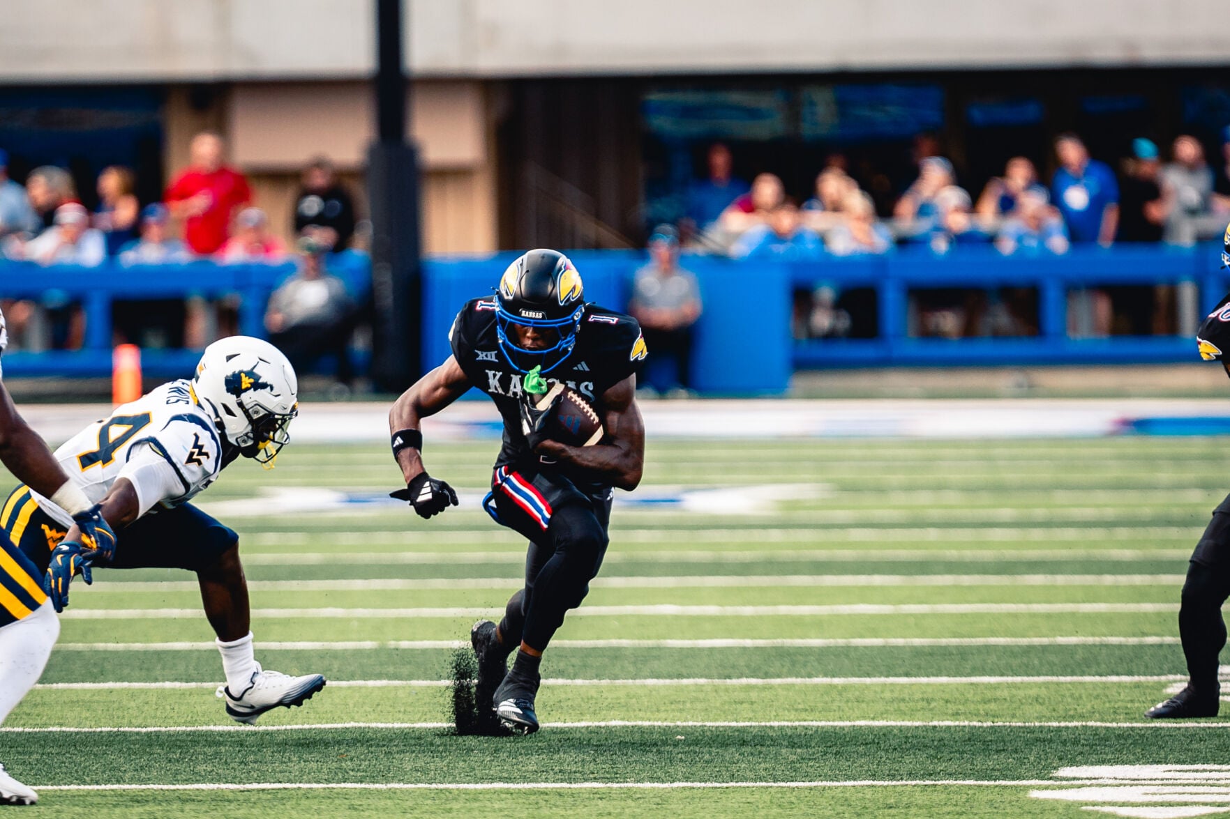 Emmanuel Henderson Jr., special teams shine in Kansas football blowout ...