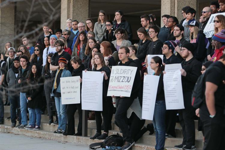 Members of Rock Chalk Invisible Hawk call for solidarity during ...