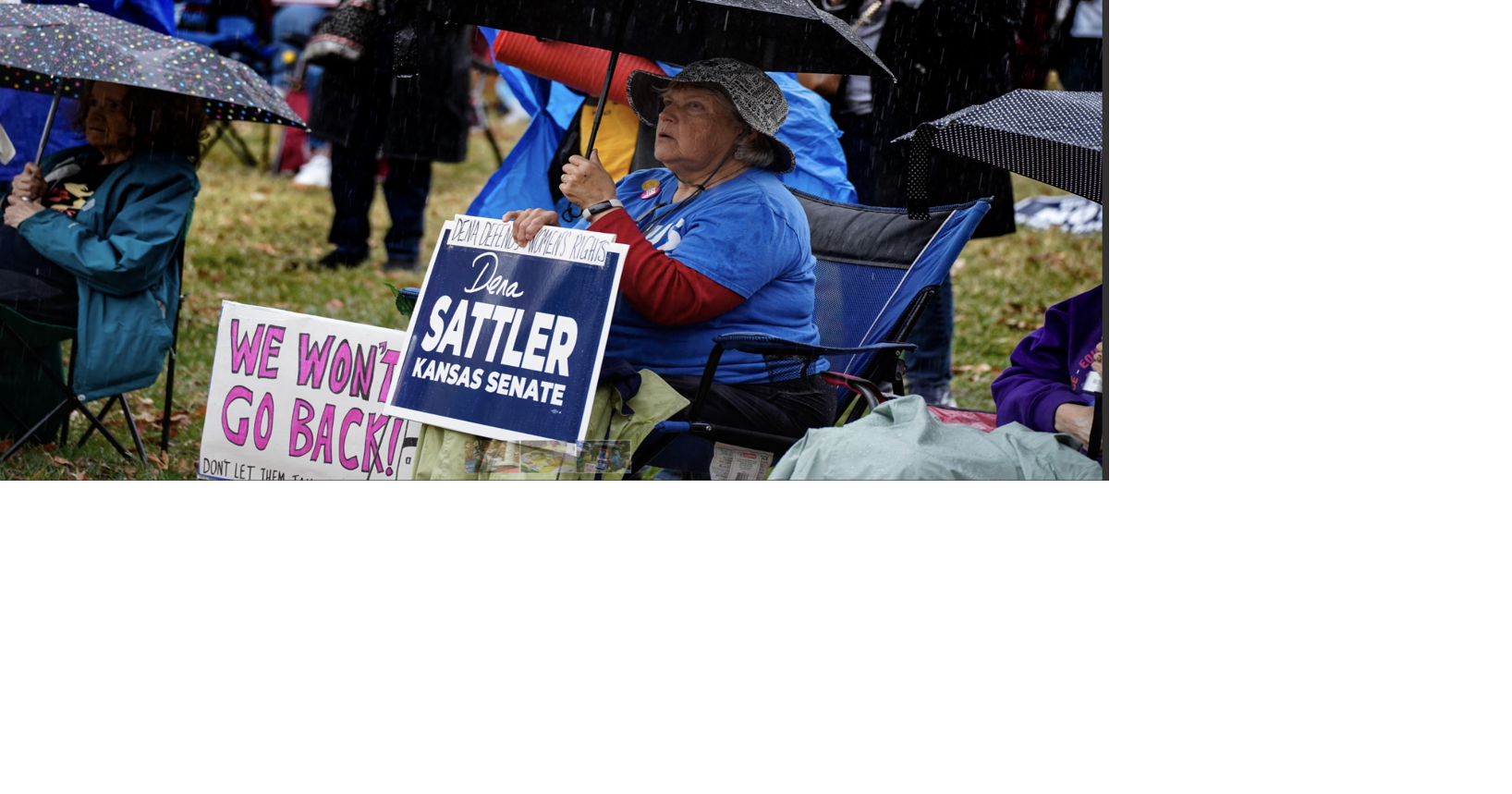 Rally in the rain: Women's rights rally held at South Park in Lawrence ...