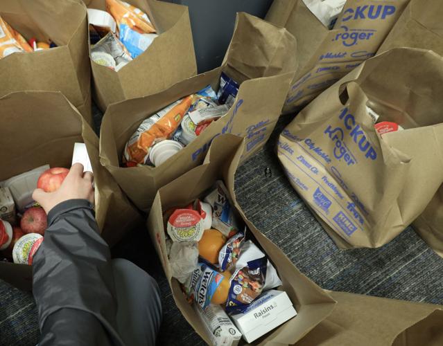 Food Flawk distributing food bags for students staying in spring break ...