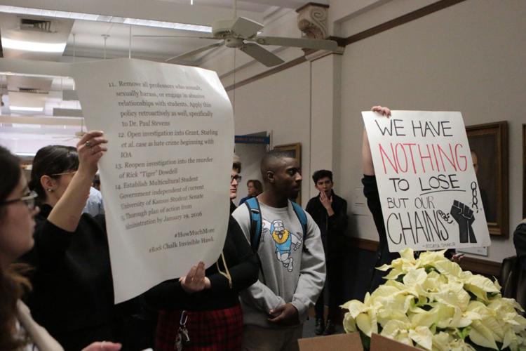 Members of Rock Chalk Invisible Hawk call for solidarity during ...
