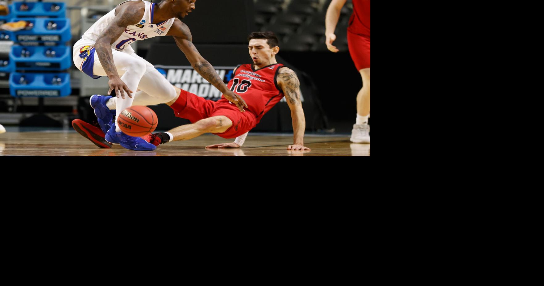 Marcus Garrett leads Kansas to first round win despite impressive ...