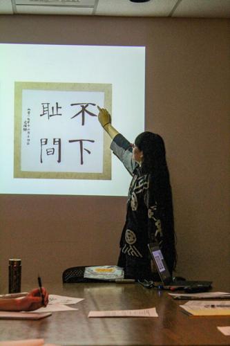 Day in the Life: Lawrence artist Hong Zhang’s art explores hair and ...