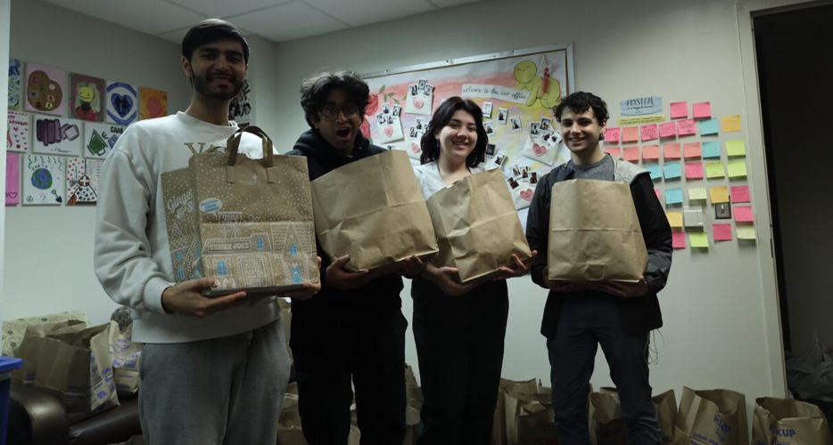 Food Flawk distributing food bags for students staying in spring break ...