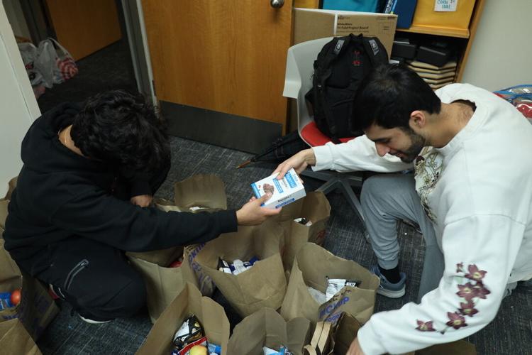 Food Flawk distributing food bags for students staying in spring break ...
