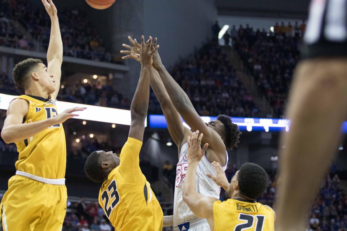Jayhawks defeat Tigers, reach goal for hurricane relief exhibition ...