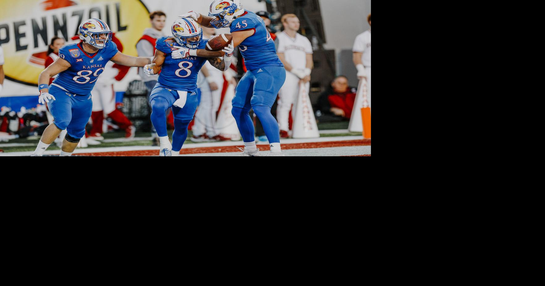 Jayhawk comeback comes up short in three overtimes of Liberty Bowl ...