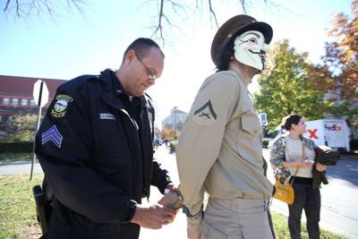 Man in mask on campus arrested, two individuals in custody | News ...