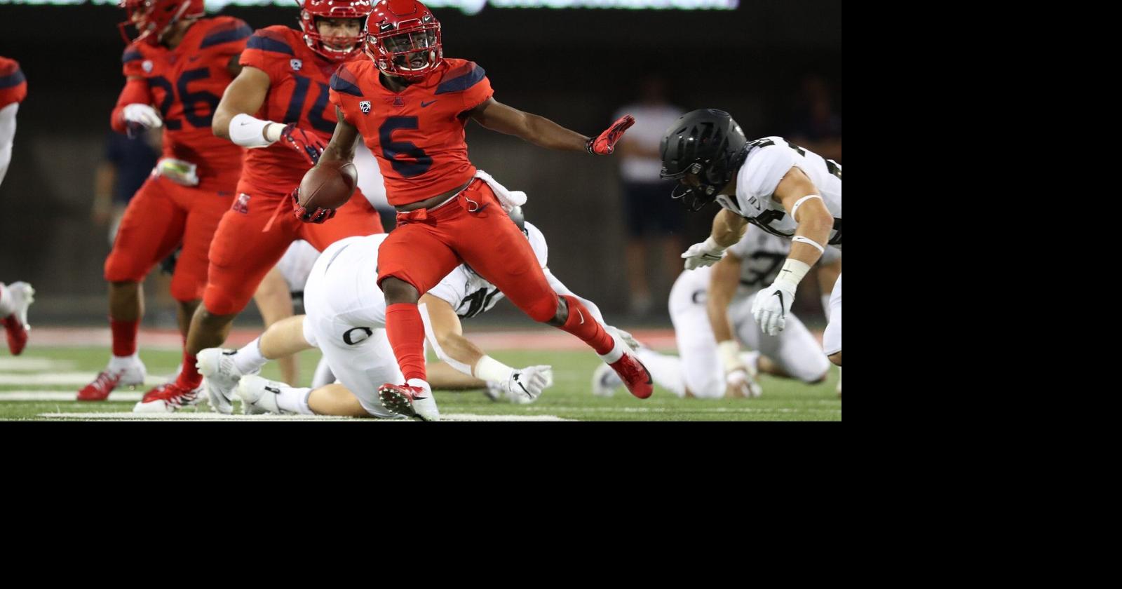 Tate returns, Arizona rolls over No. 19 Oregon 44-15 | | kdminer.com
