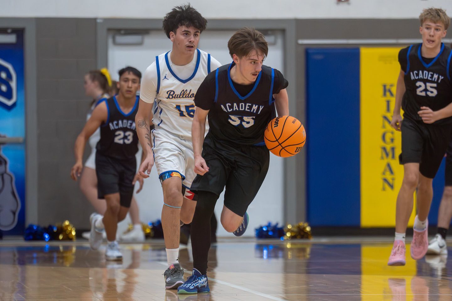 Kingman Academy boys basketball takes down Kingman for first win of the season | Sports ...