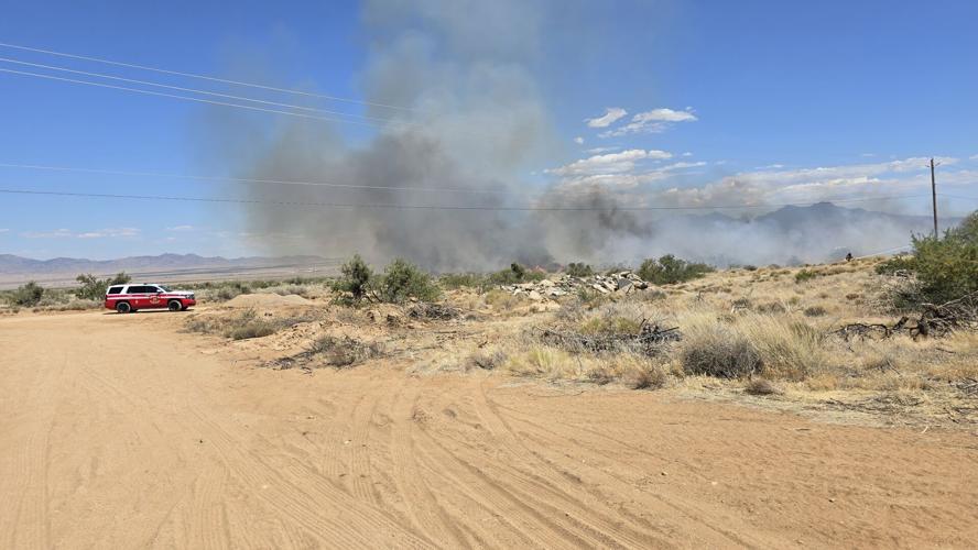 Wildfire 10 miles north of Kingman burning 831 ares, 100 contained ...