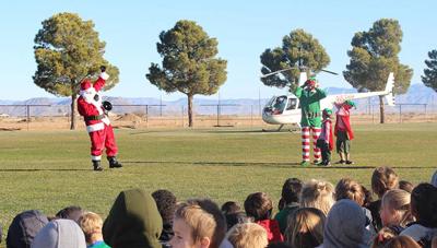 Santa paid a helicopter visit to local elementary schools | Archives ...
