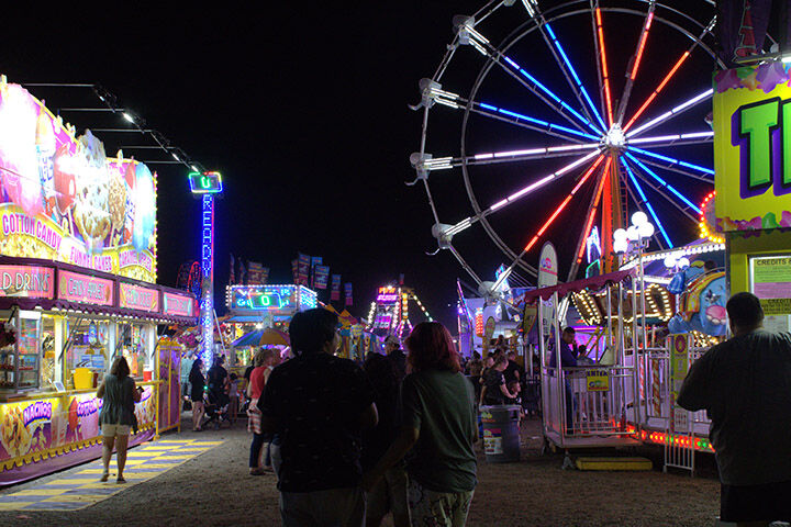 First night at the fair shines with carnival lights and showmanship ...