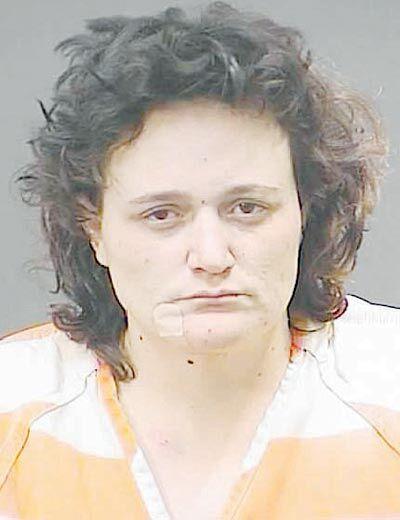 Woman Arrested After Ramming Truck Into Own Porch