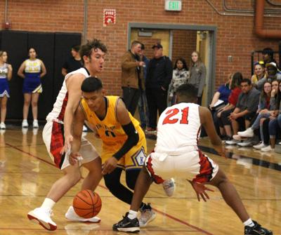 Prep Basketball: Vols cruise to season-opening win over Kingman ...