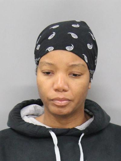 Woman linked to Motel 6 robbery free on bond