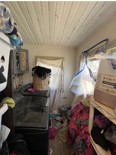 Two Rivers lead hazard reduction program repairs first home