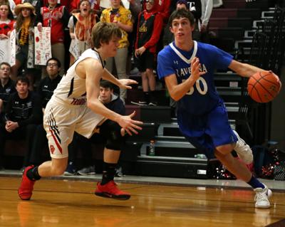 Ravenna’s Josh Bauer scores 24 points in win