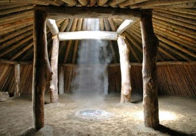 Earth lodge at archway builds bond