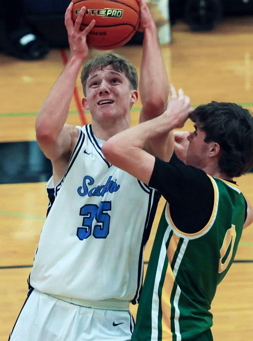 PHOTOS: Kearney Catholic girls and boys basketball at Grand Island ...