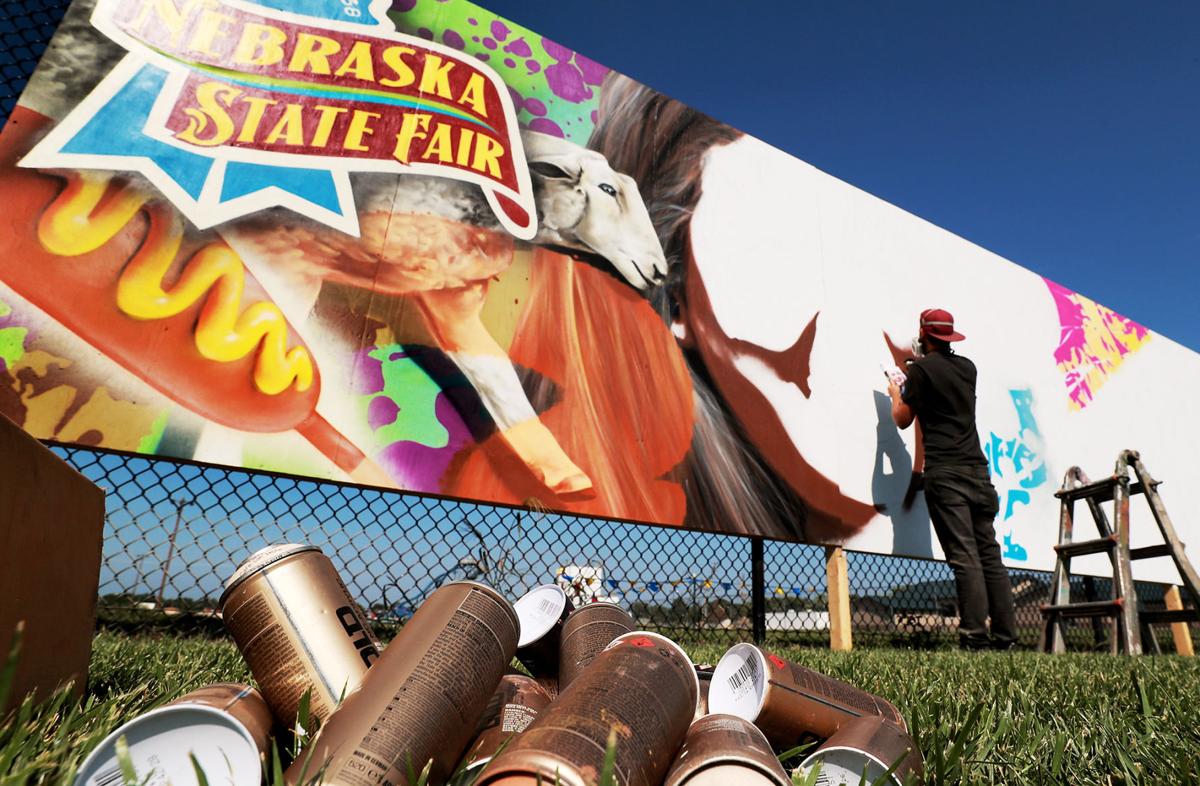 'I want them to smile': Connecticut artist ARCY creates murals for ...