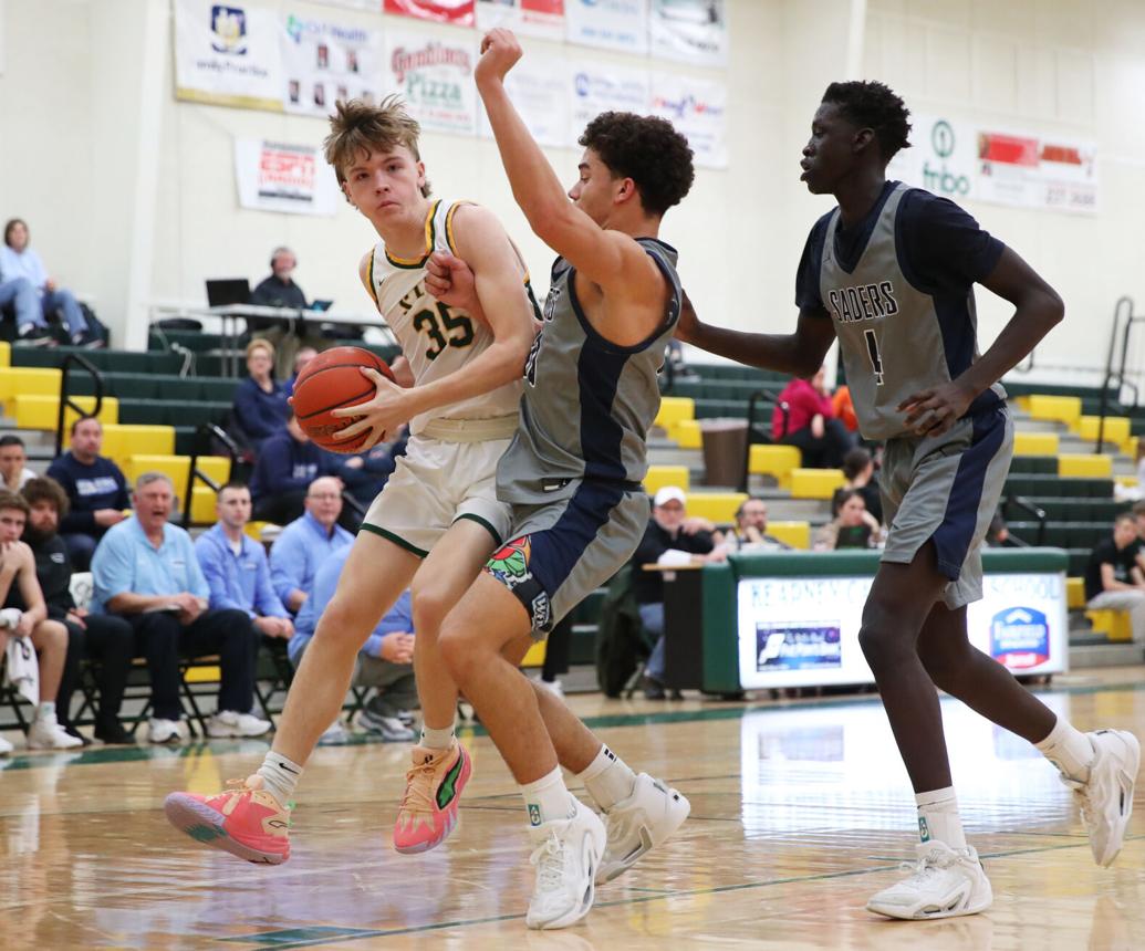 "Photos" Kearney Catholic and GICC boys basketball