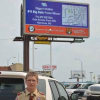 Scout wins contest, with Digger’s Hotline poster on billboards