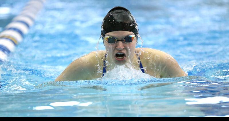 Kearney boys swim team wins own invite, combined championship