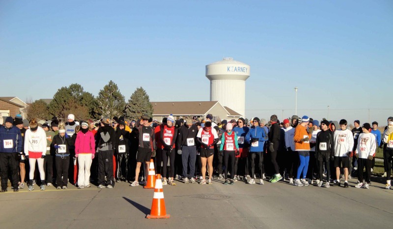Turkey Trot runners celebrating tradition Thanksgiving Day