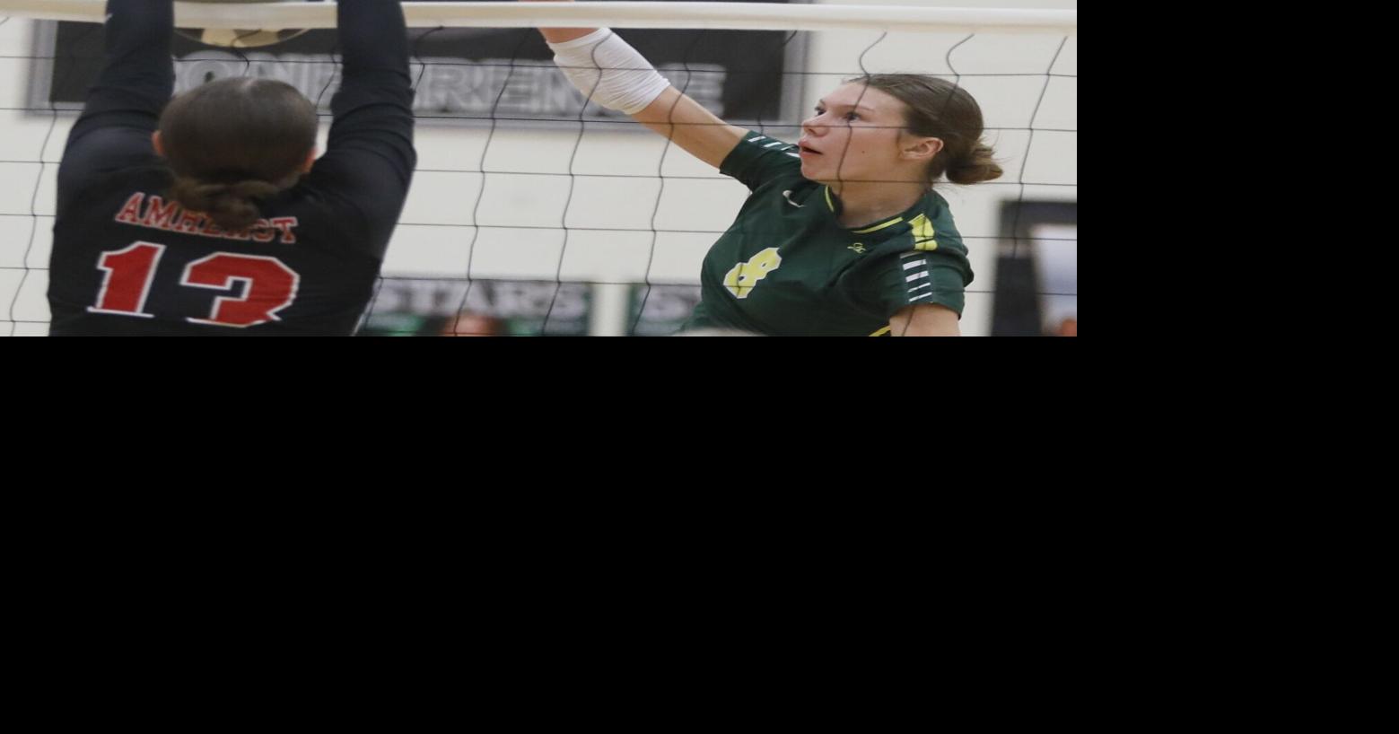 Kearney Catholic overpowers Amherst in four-set match