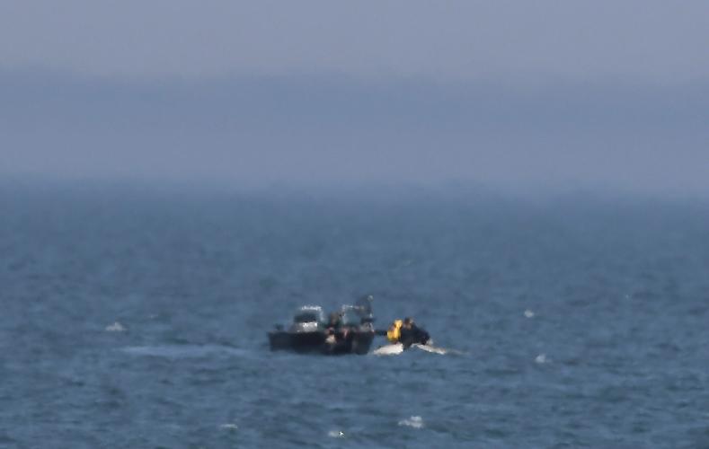 Three recovered from Lake Michigan after boat flips over at Kenosha