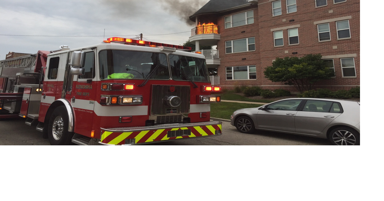Balcony fire in condo building displaces some residents