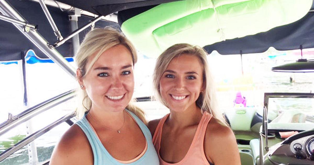 These two 'babes' have fun keeping boats clean