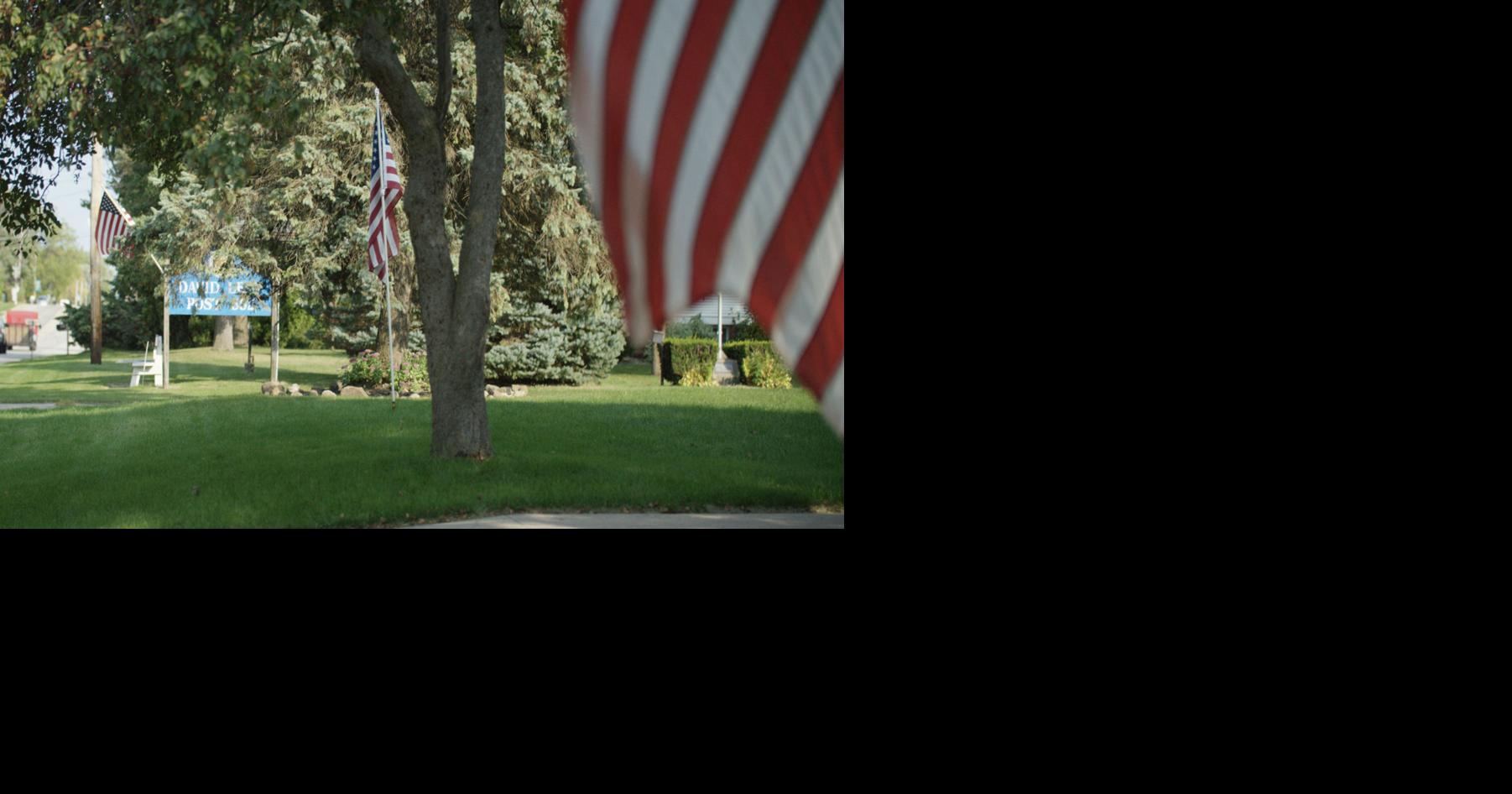Pritzker team invites Somers residents to raise an American flag on them