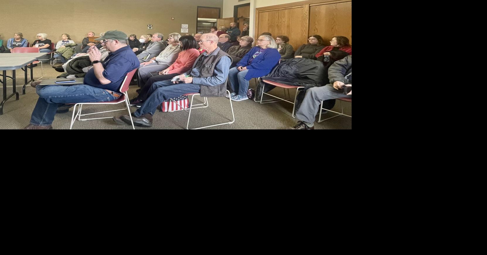 Community Library Board meeting draws crowd of supporters, critics