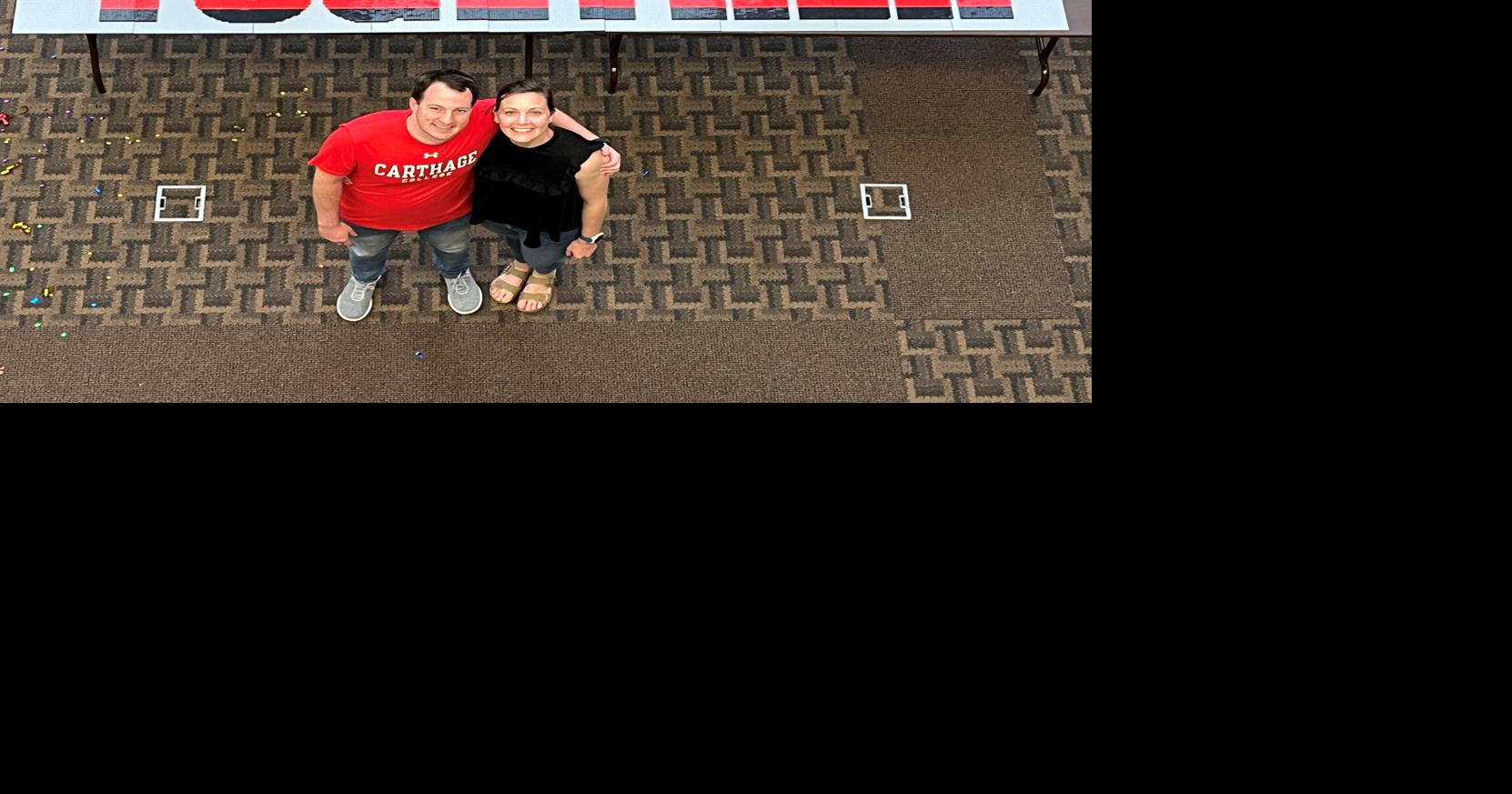 Carthage alum completes attempt at LEGO brick word world record