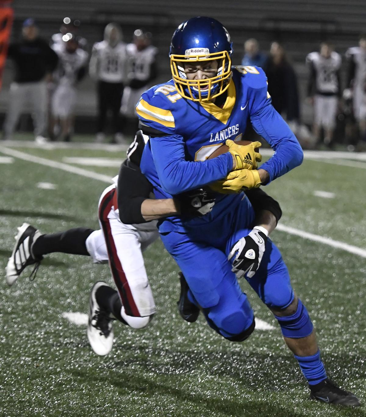 High school football: St. Joseph advances, Bradford falls in first ...