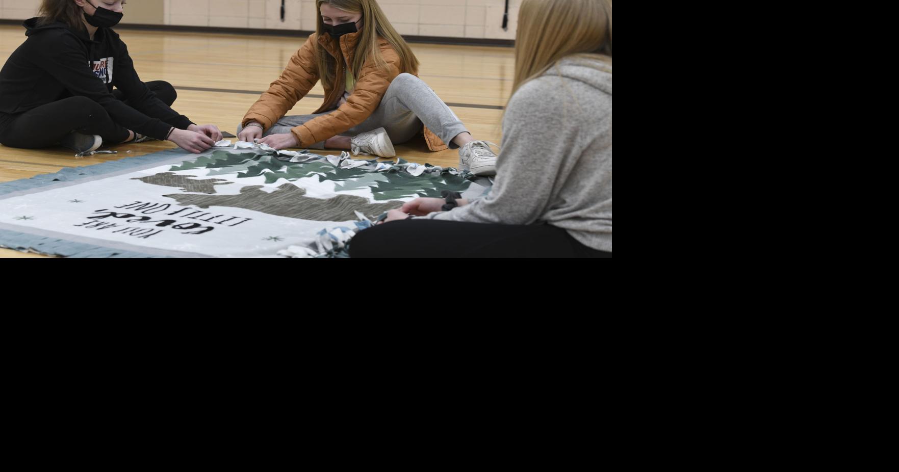IN PHOTOS AND VIDEO: Fleece blanket assembly at Lance Middle School