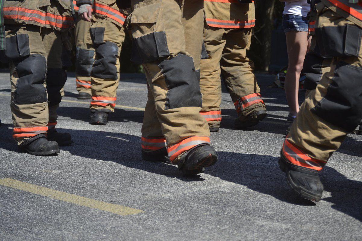 Remembering 9/11 Firefighters climb tower in honor of first-responders ...