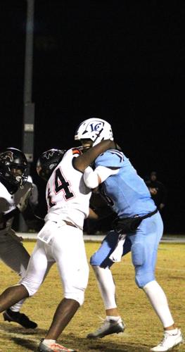 Tigers prevail in district battle against Logan County | Sports ...