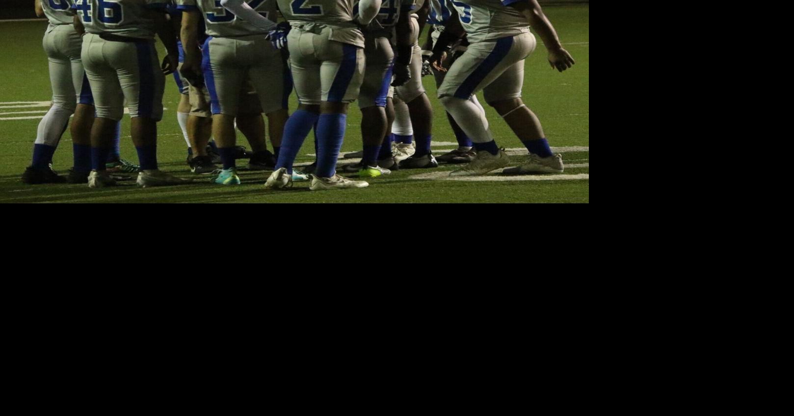 Members of the Fort Campbell Falcons in a huddle during Friday night's ...