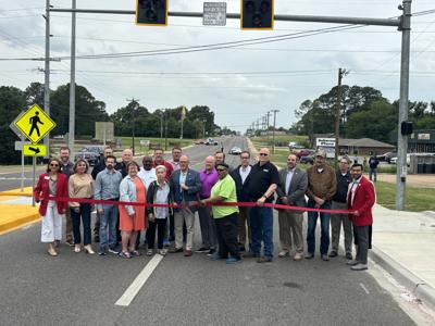 New HAWK crosswalk officially open for pedestrians on Johnson Avenue ...