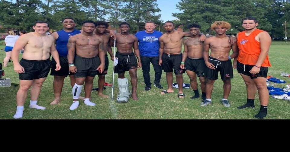 LC Football players get baptized | Sports | klax-tv.com