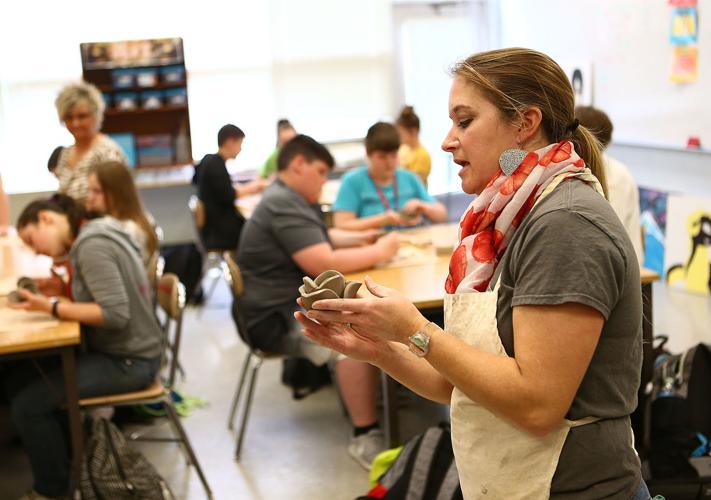 Molding a Memorial: Miami Co. residents crafting 1,350 clay poppies to ...