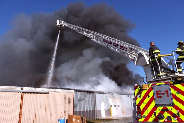 PHOTOS: Fire rages for hours at Maple Grove Distributing | News ...