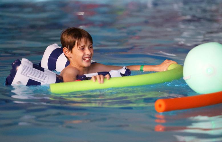 PHOTOS: Kokomo YMCA's glow swim and movie | News | kokomotribune.com