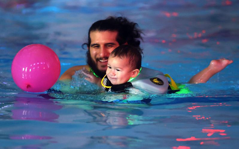 PHOTOS: Kokomo YMCA's glow swim and movie | News | kokomotribune.com