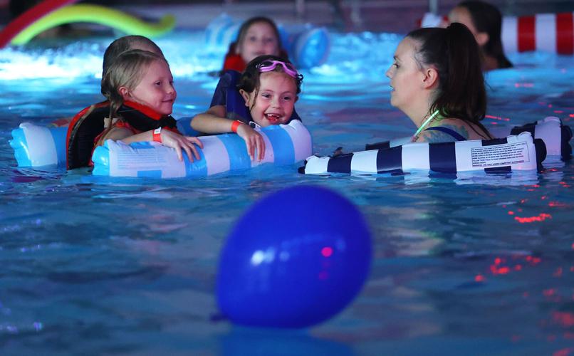 PHOTOS: Kokomo YMCA's glow swim and movie | News | kokomotribune.com