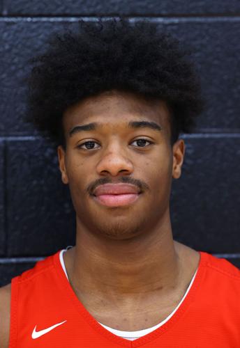 BOYS BB: Titans withstand Trojans’ upset bid, remain undefeated in HHC ...