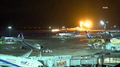 Fiery collision on Tokyo runway; five dead | | kten.com